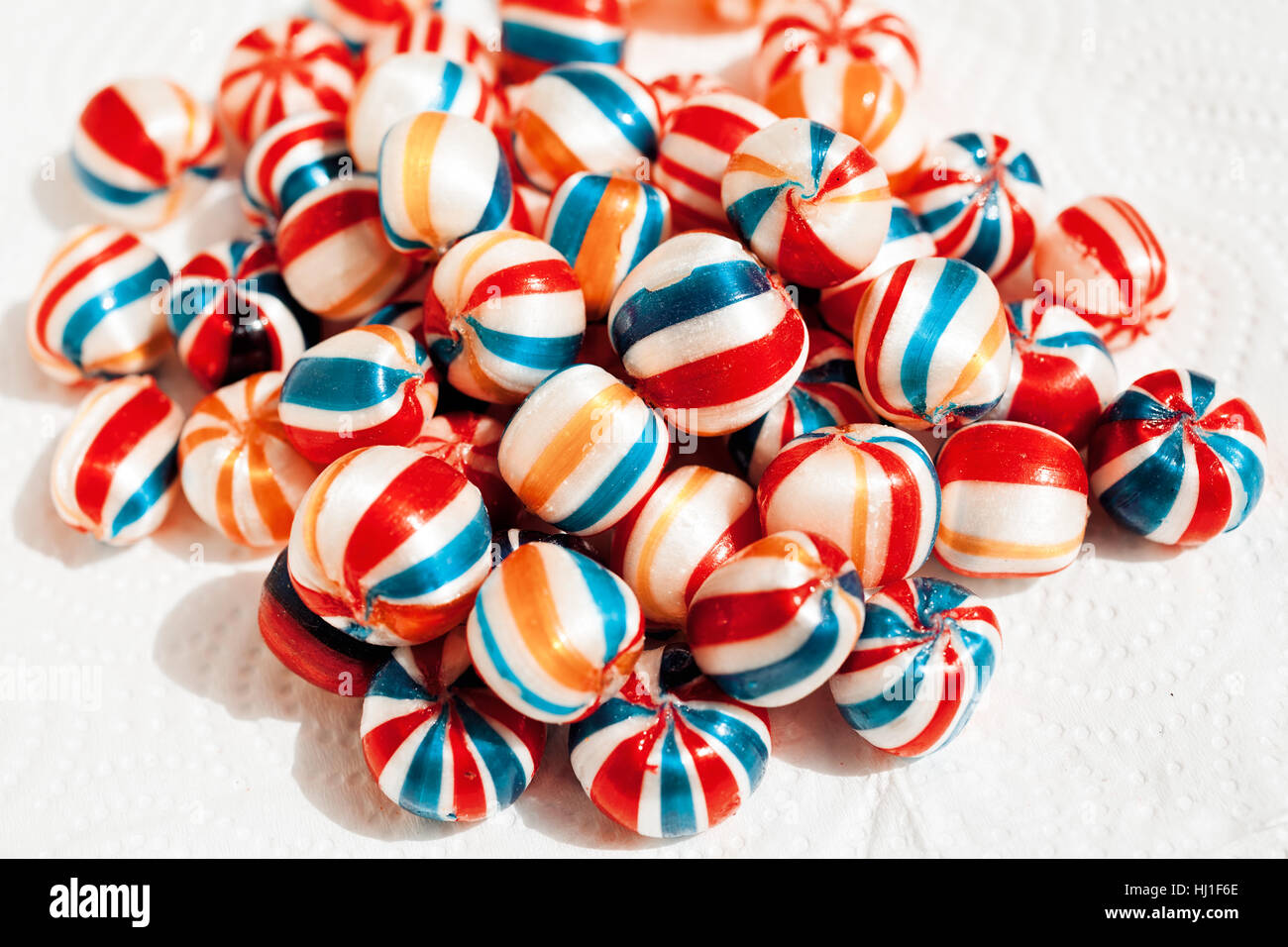 colorful candies on the white background, note shallow depth of field ...