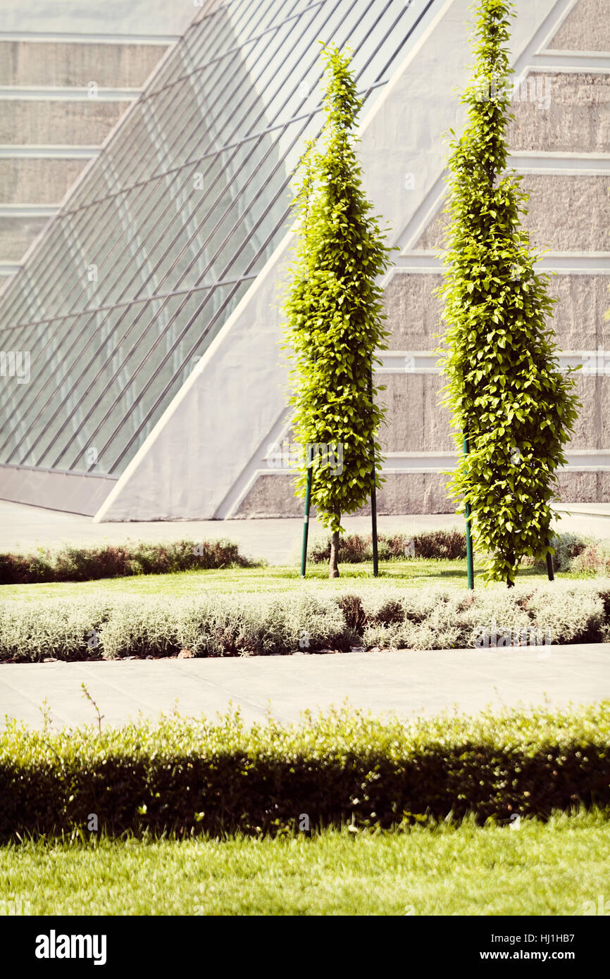 landscaping of the park around the building, note shallow depth of ...
