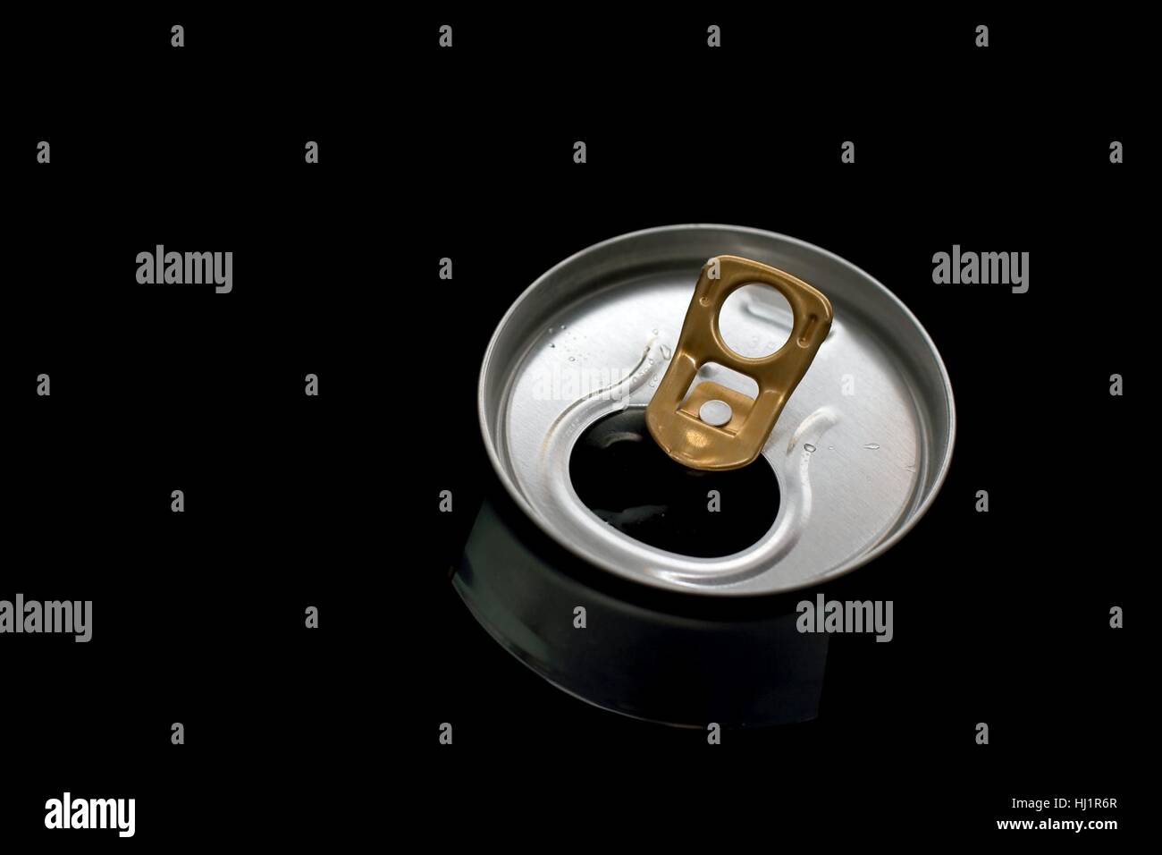 An open can of beer isolated on black Stock Photo - Alamy