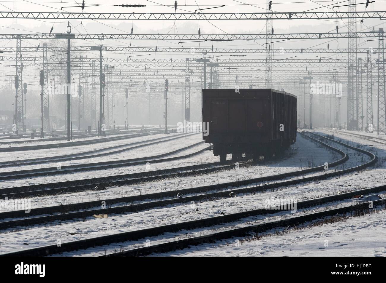 Railway track system in winter covered with snow Stock Photo - Alamy