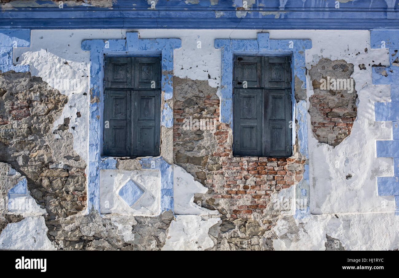Old house with windows, collapse wall Stock Photo - Alamy