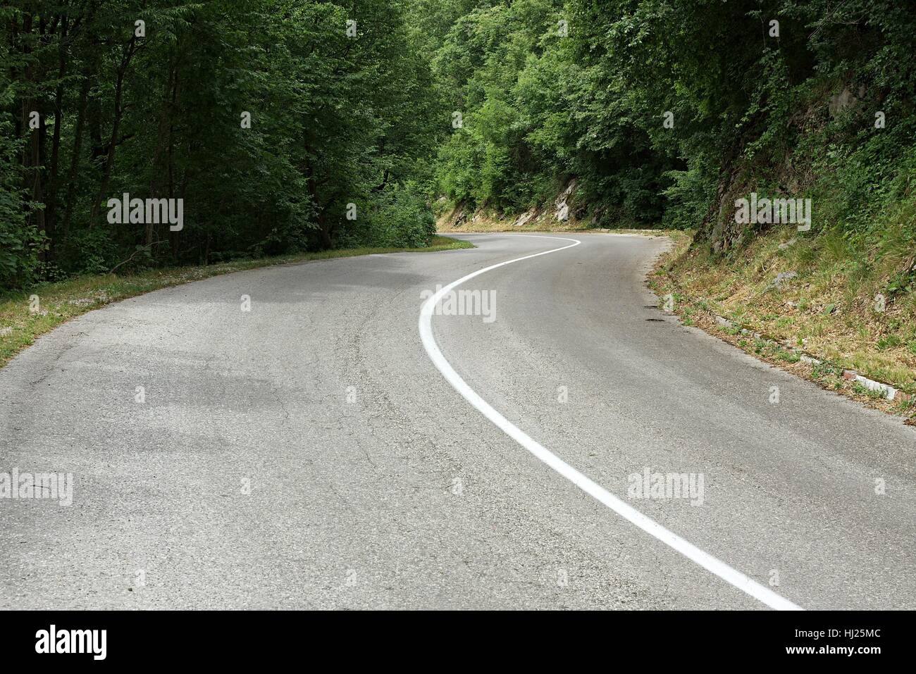 Old narrow tarmac mountain road hi-res stock photography and images - Alamy
