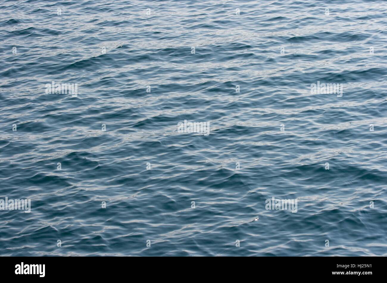 Wavy water surface of the sea Stock Photo - Alamy