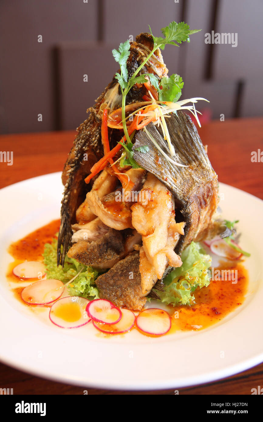Thai food deep fried fish Stock Photo - Alamy
