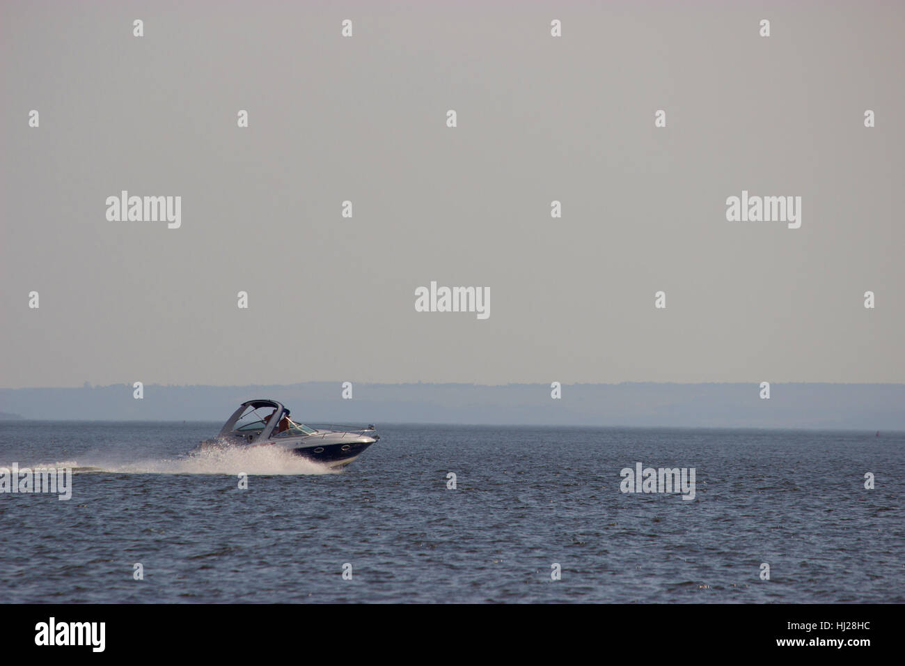 motorboat with waves on the sea, sunny summer day Stock Photo - Alamy