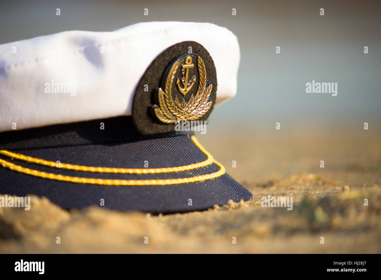 capitan cap on the beach. travel concept Stock Photo - Alamy
