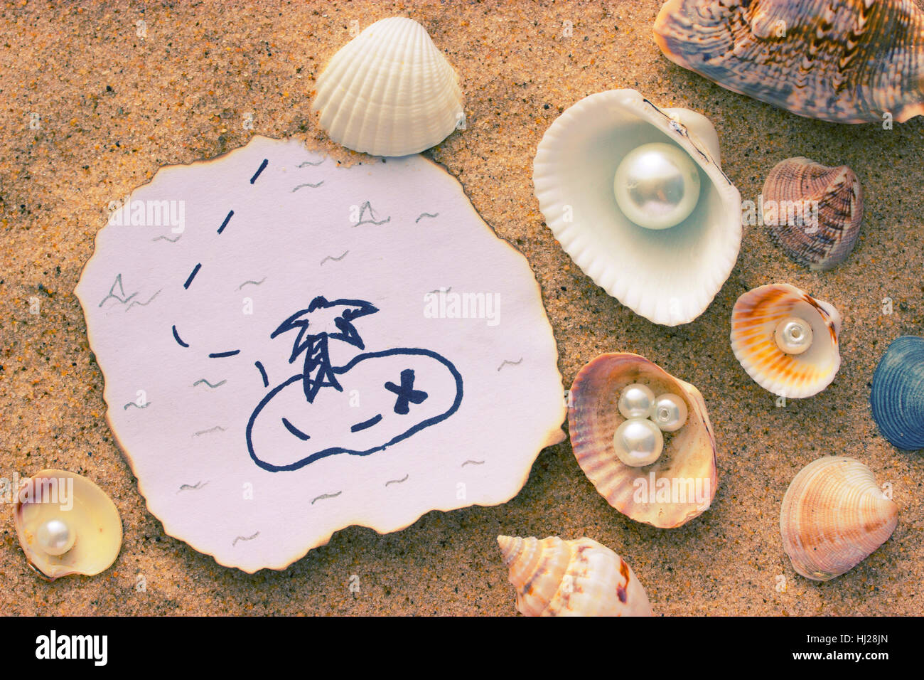 shell and map background on the beach Stock Photo - Alamy