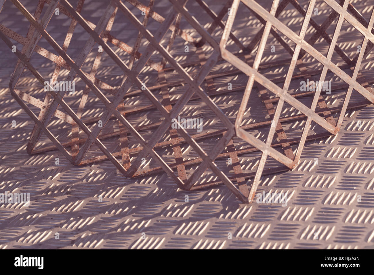 the shadow of the iron bars in construction, note shallow depth of ...