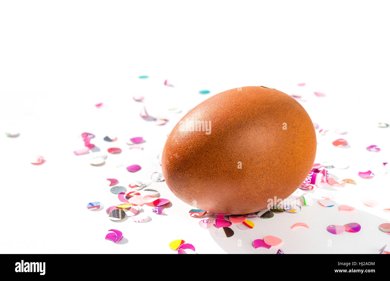 Chicken egg with shadow Stock Photo - Alamy