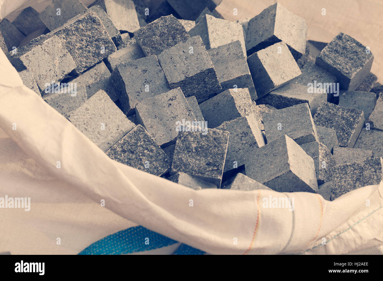 granite cubes in a plastic sack, note shallow depth of field Stock ...
