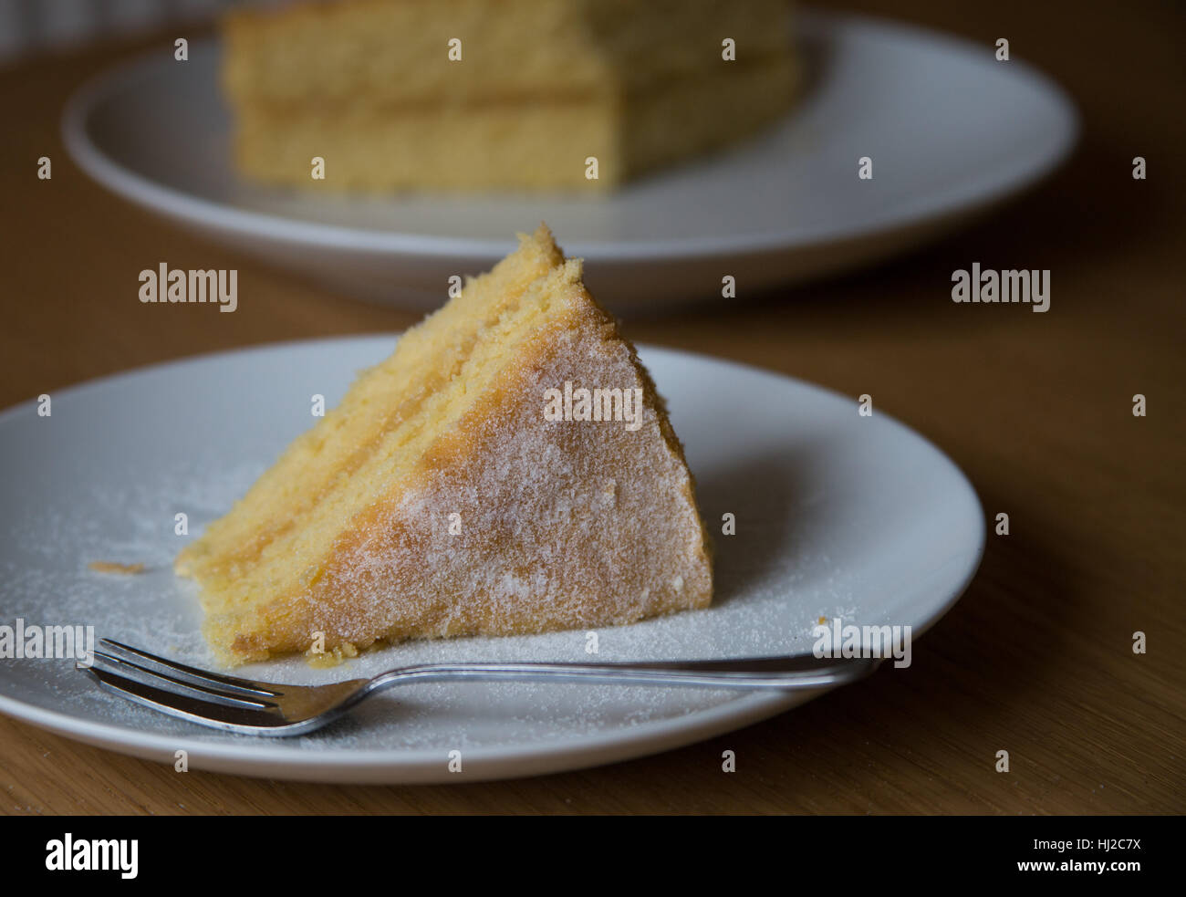A slice of victoria sandwich sponge cake Stock Photo - Alamy