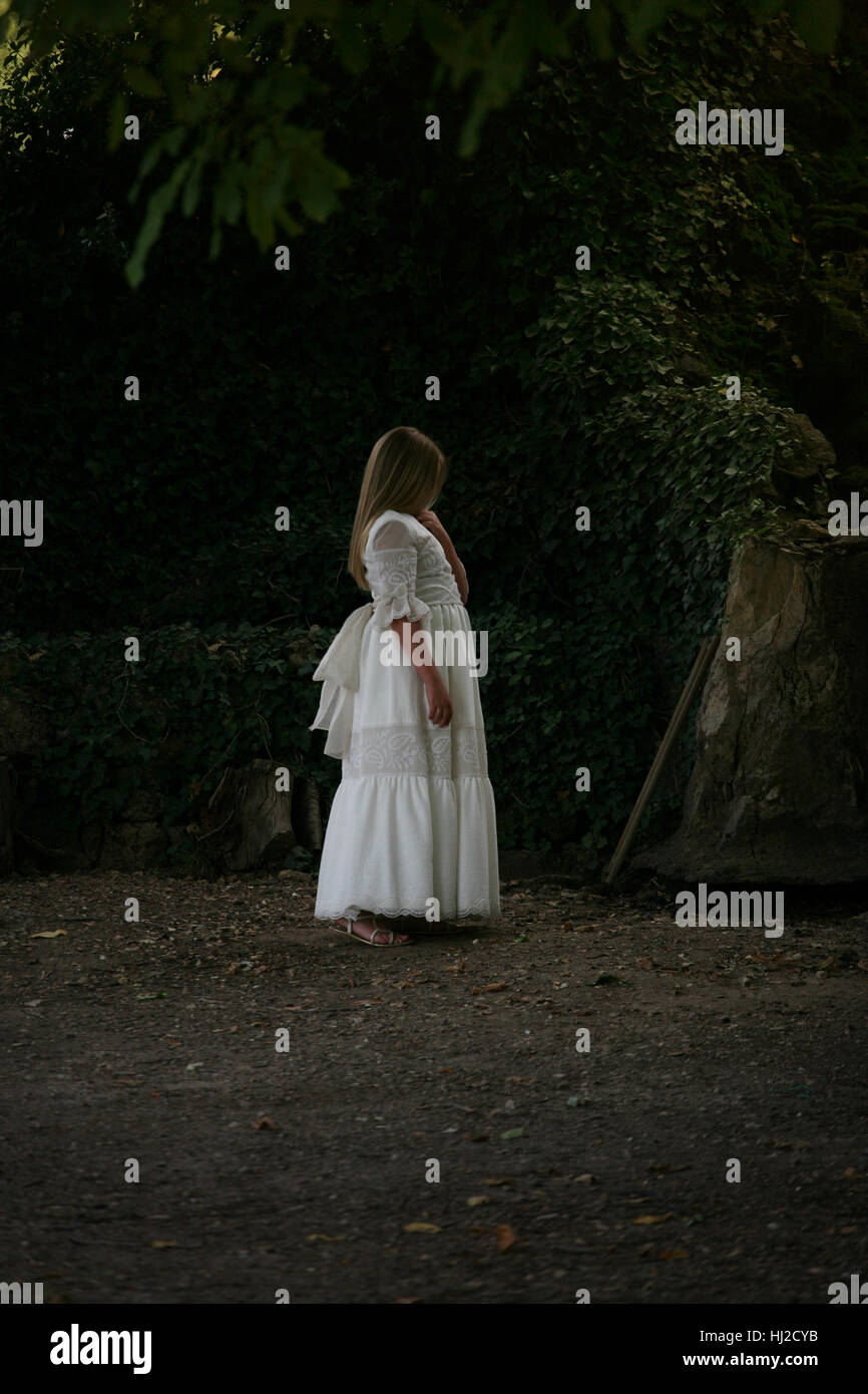 White princess wandering the woods Stock Photo - Alamy