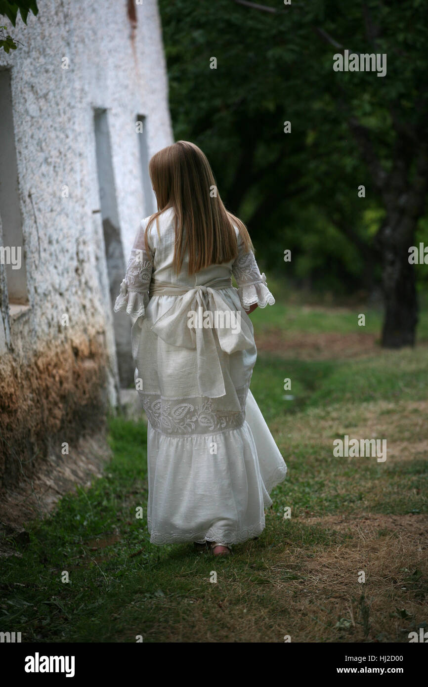 White princess wandering the woods Stock Photo - Alamy