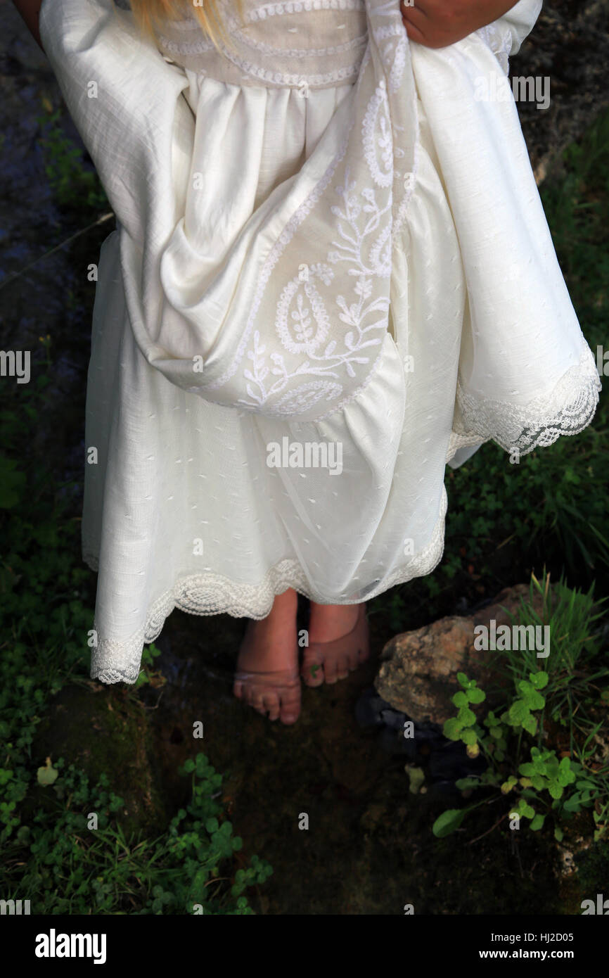 White princess wandering the woods Stock Photo - Alamy