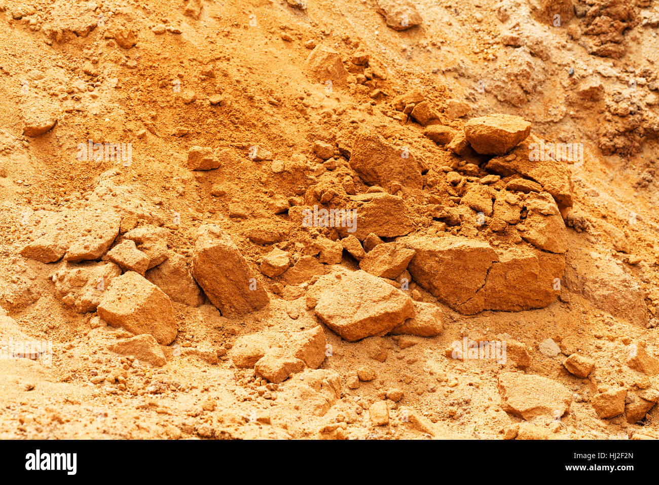 yellow sand in construction Stock Photo - Alamy