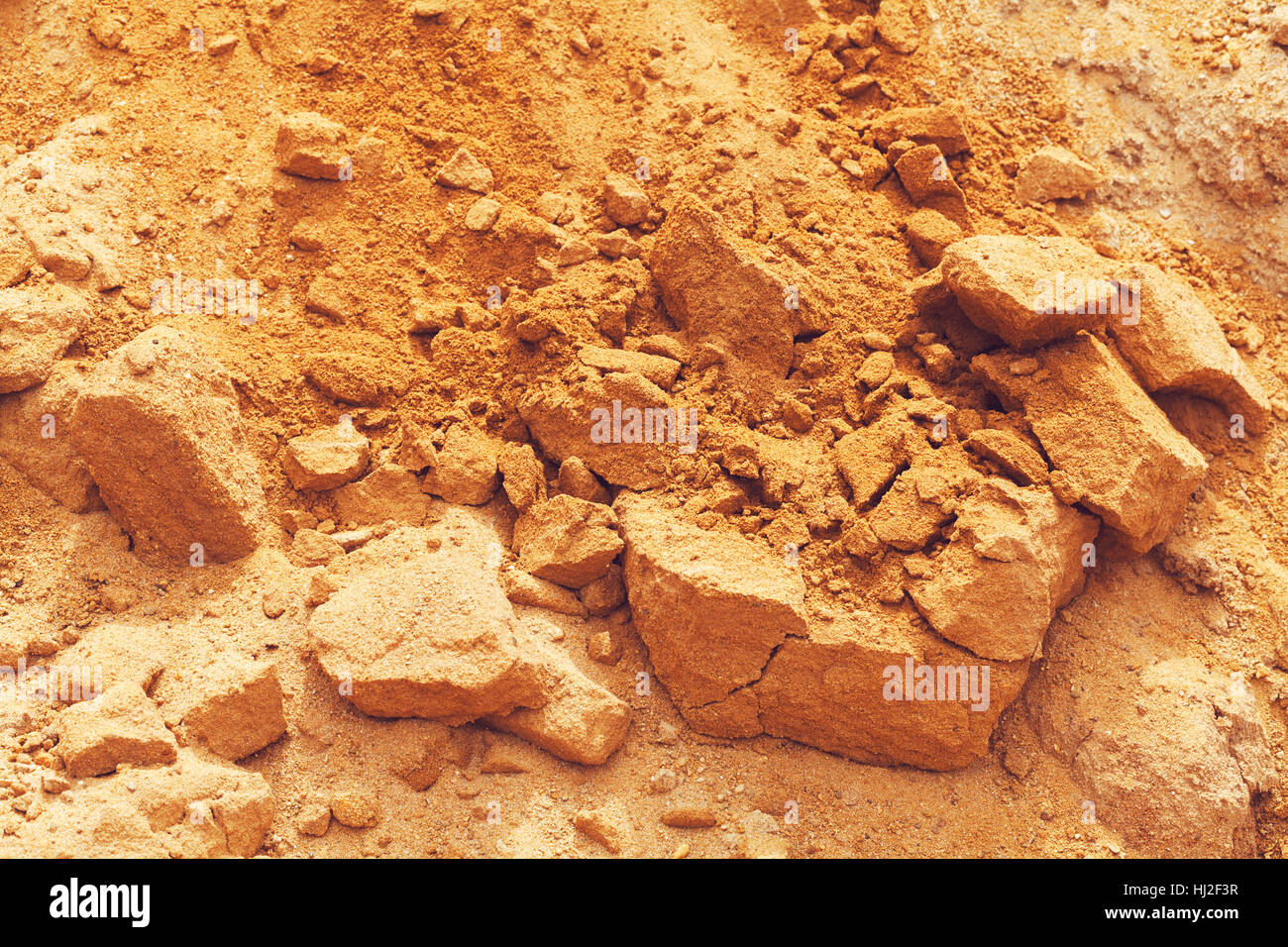 yellow sand in construction Stock Photo - Alamy