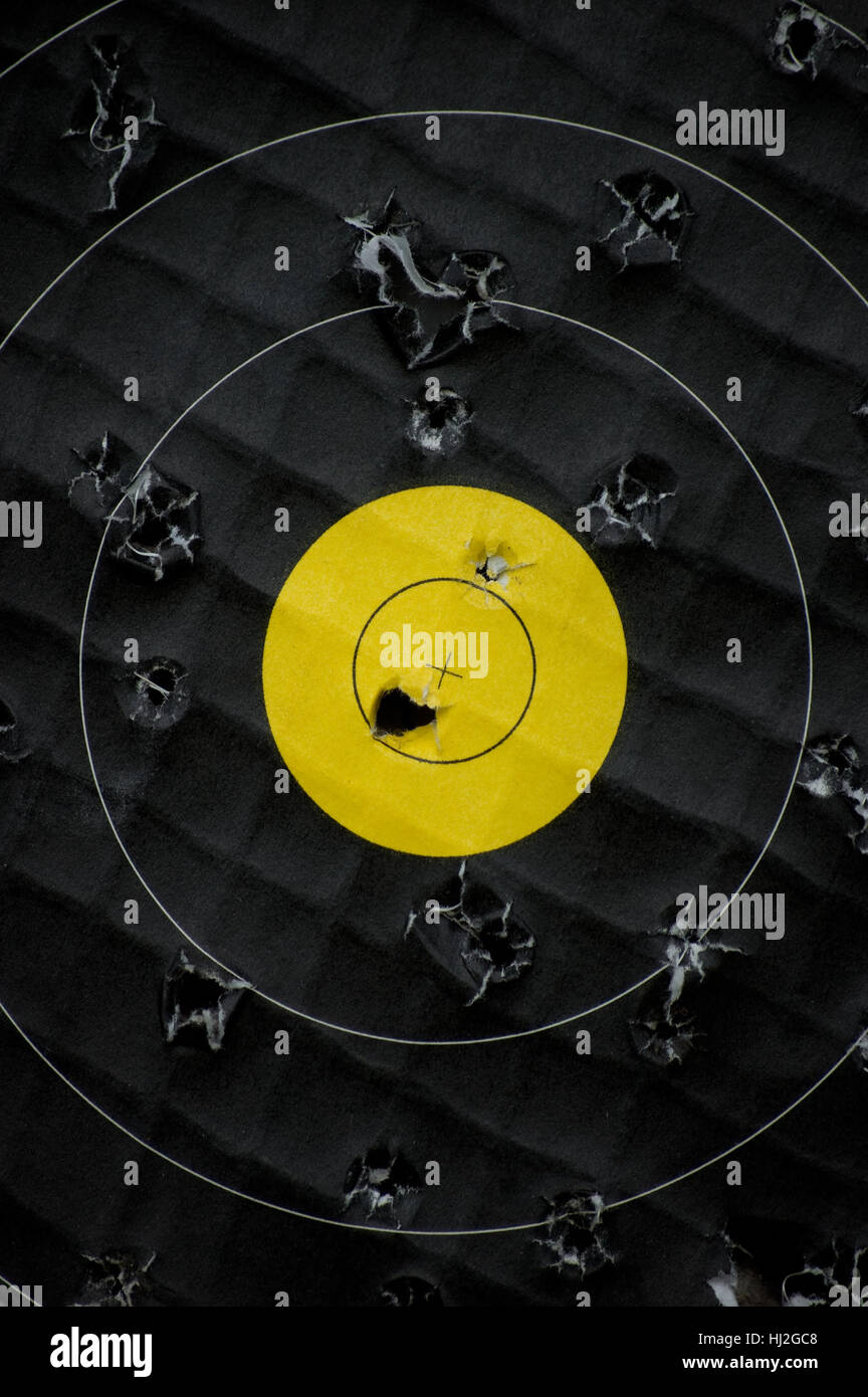 Bulls Eye with yellow Center with lot of Hits Stock Photo - Alamy