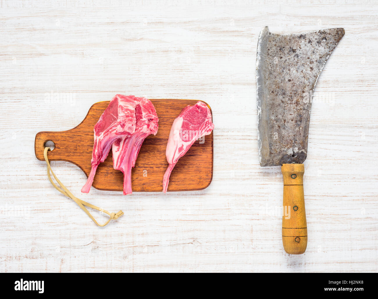 Top View of Raw Lamb Chops with Old Meat Cleaver Stock Photo - Alamy