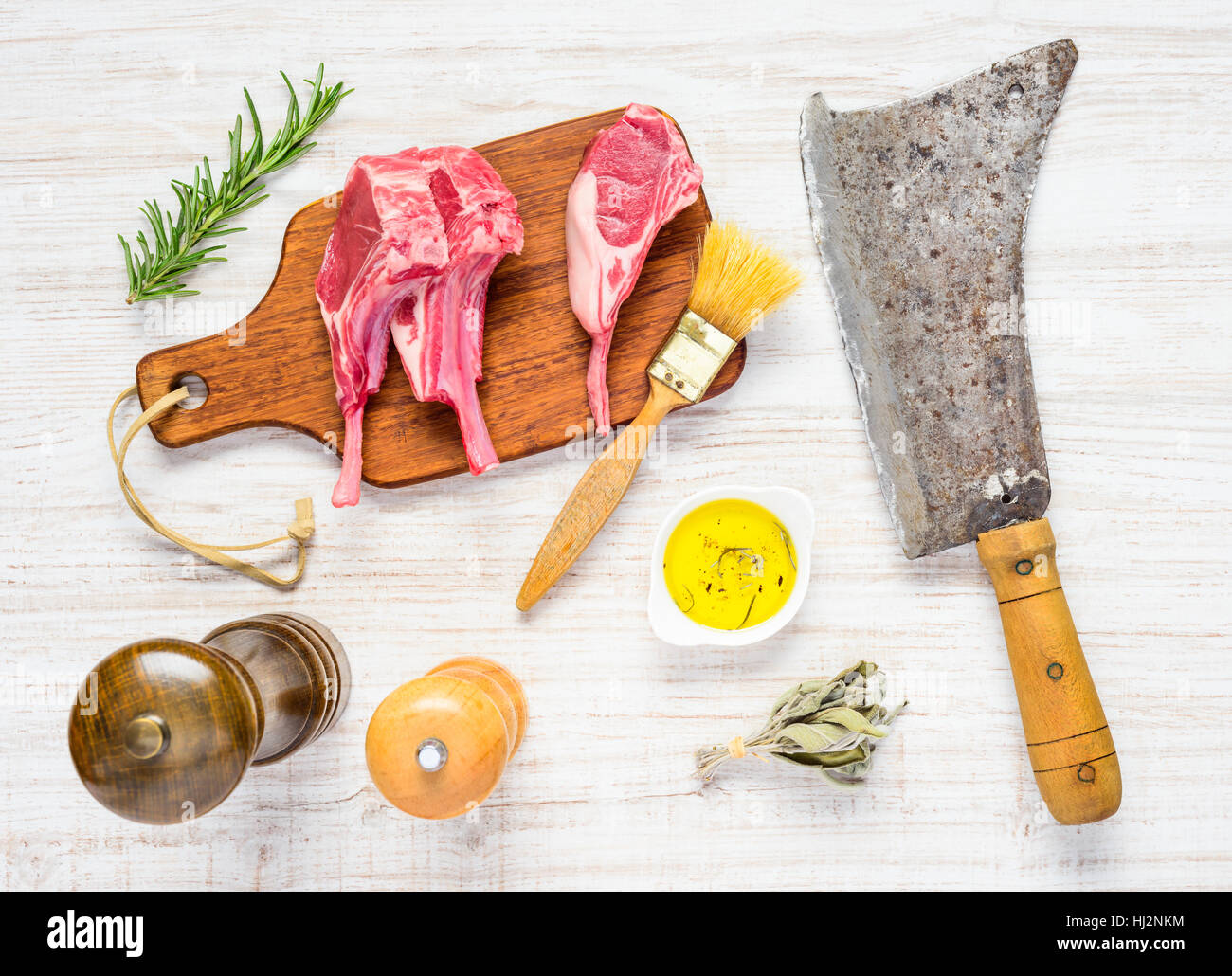 Cleaver in raw meat hi-res stock photography and images - Alamy