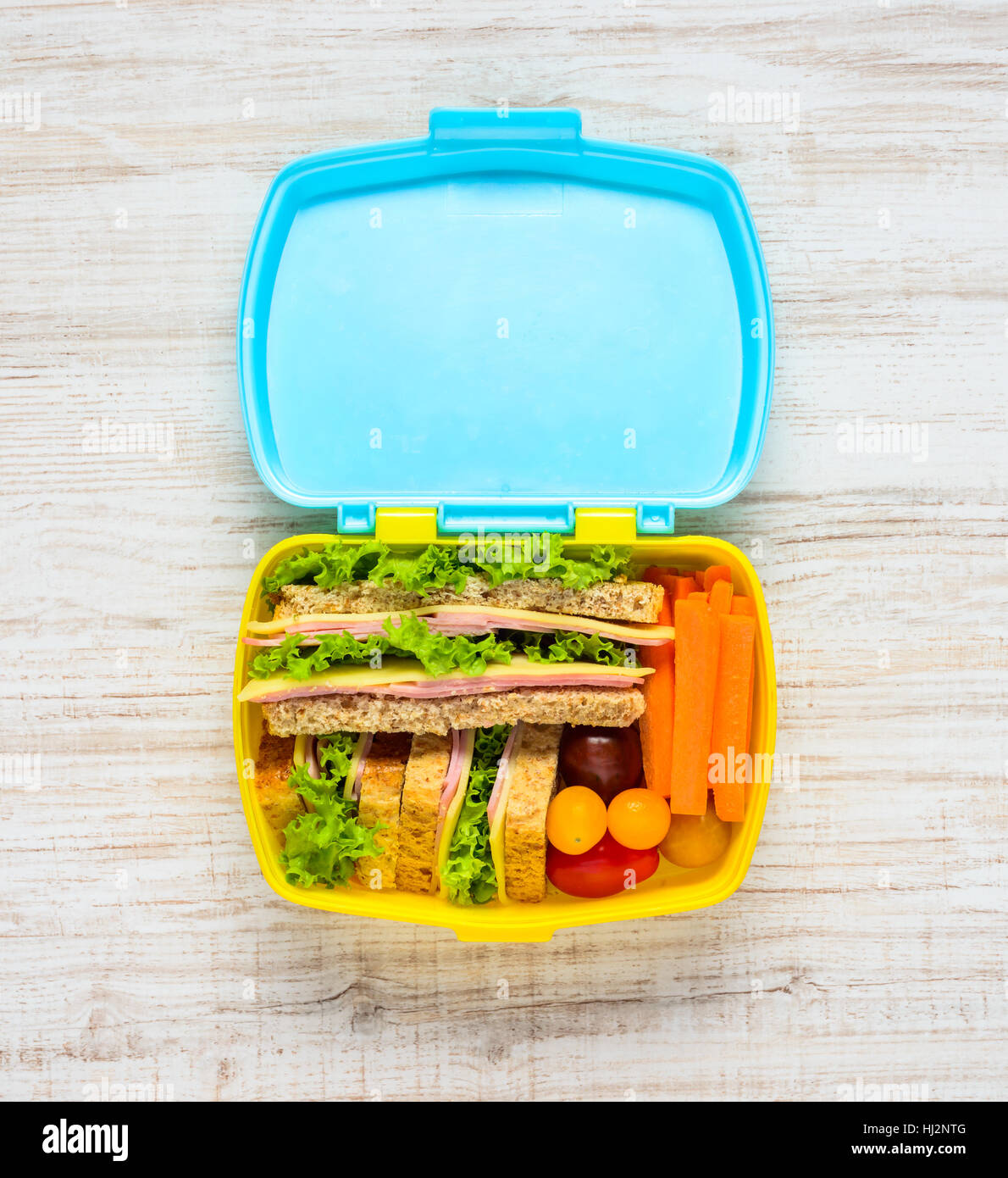 Top View of Full Lunch Box with Tasty Sandwich and Vegetables Stock ...