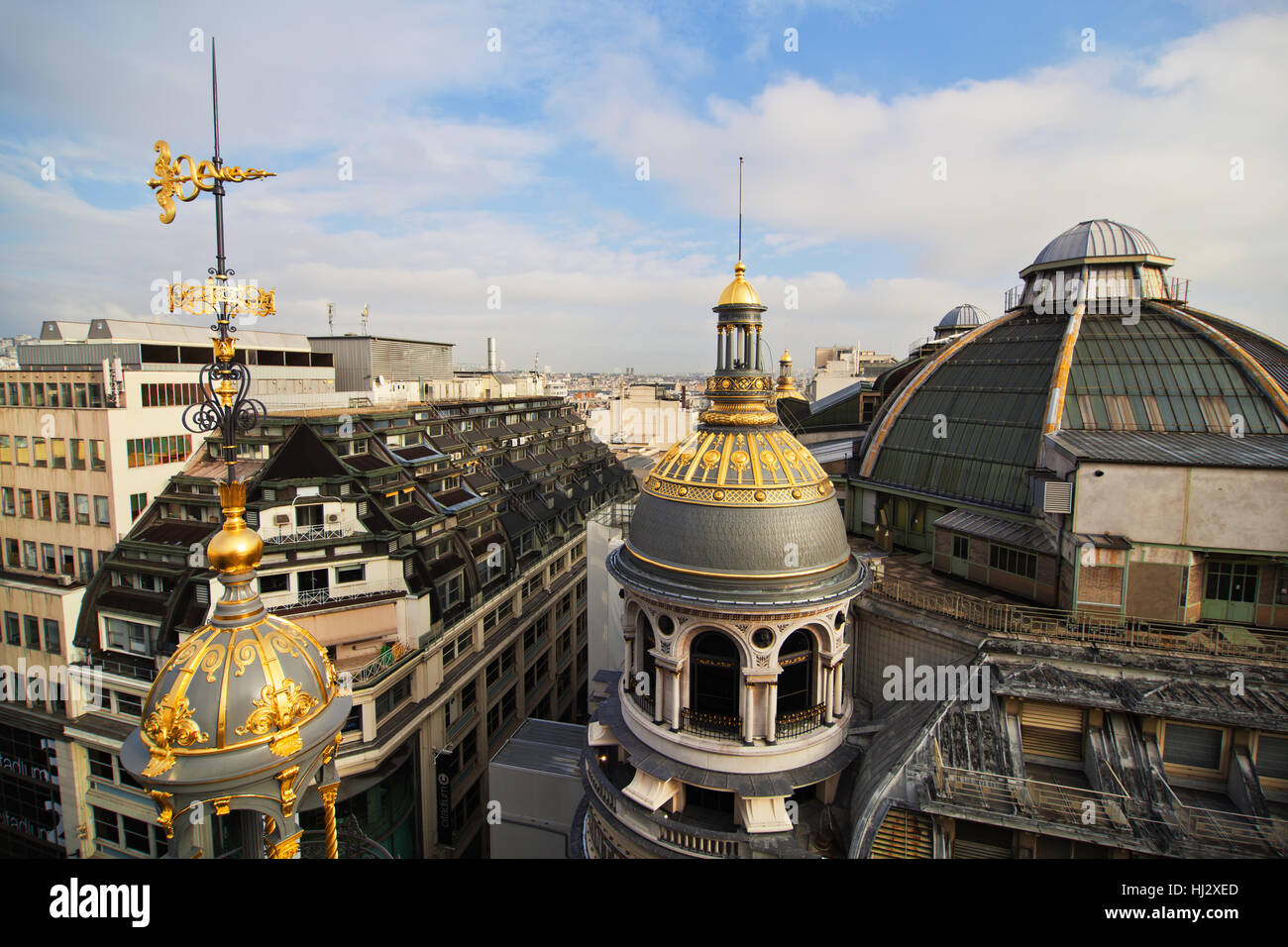 golden domes of the gallery printemps in paris Stock Photo - Alamy