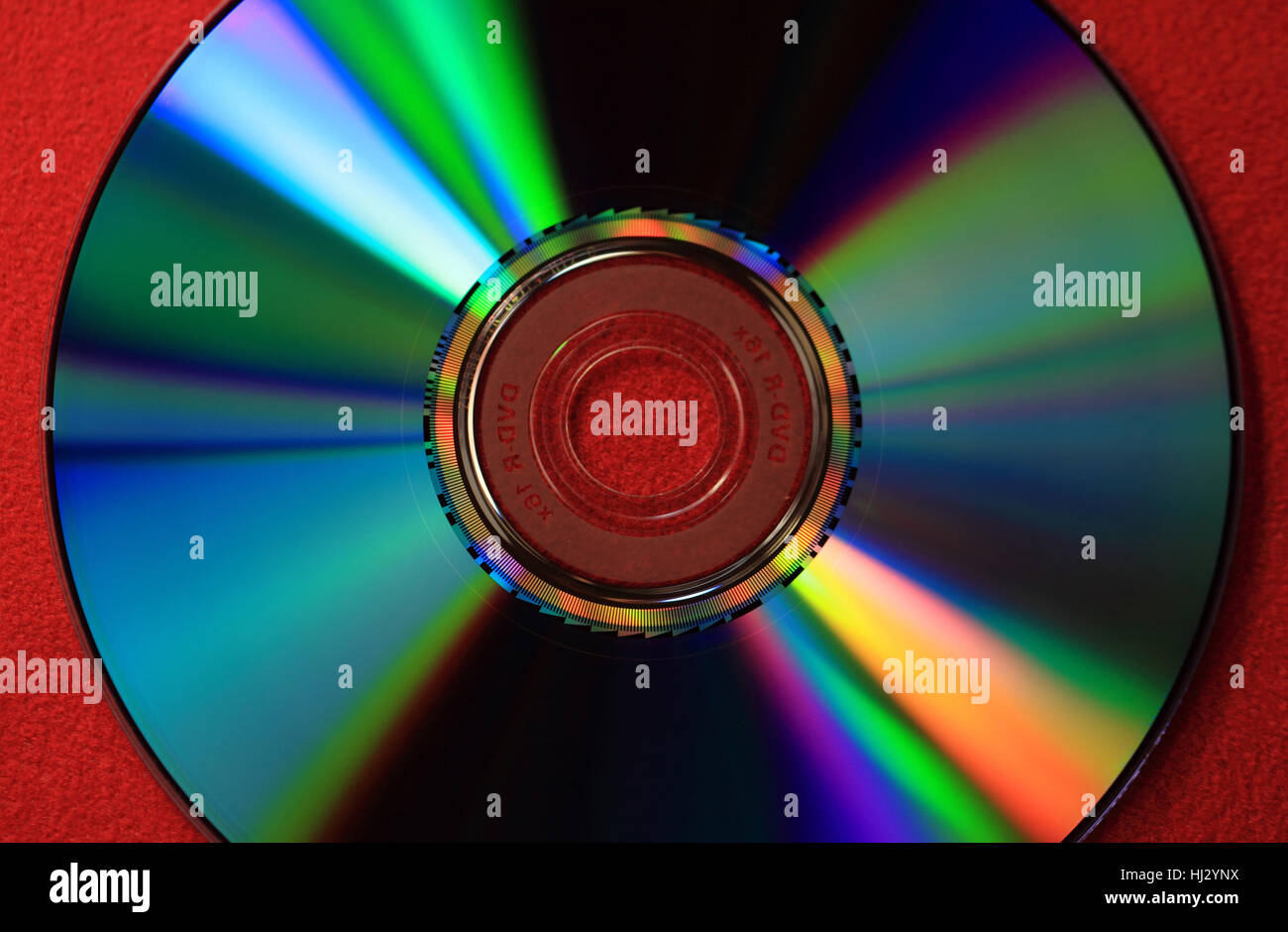 Digital Versatile Disk isolated on red background Stock Photo - Alamy