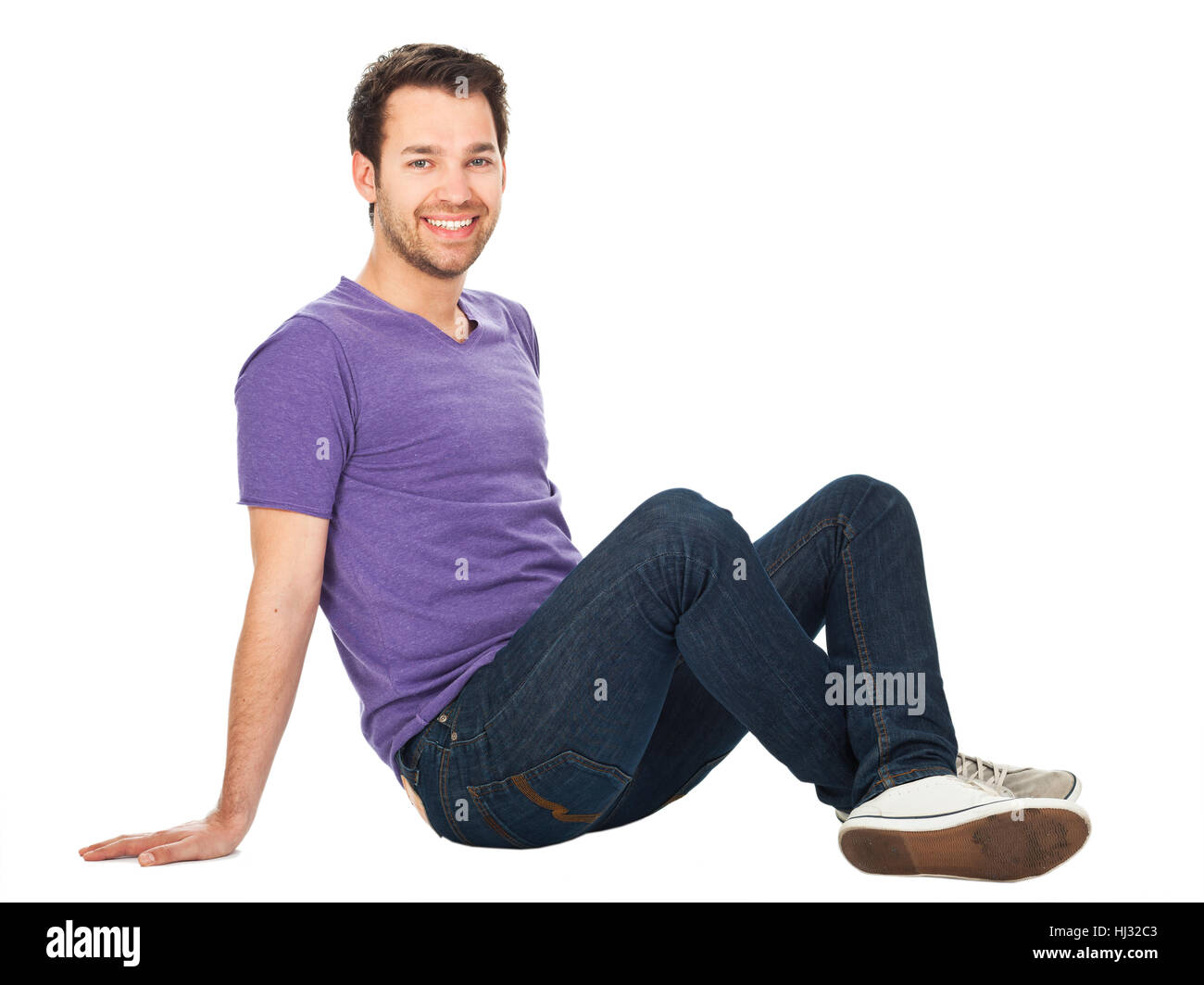 young man sitting Stock Photo - Alamy