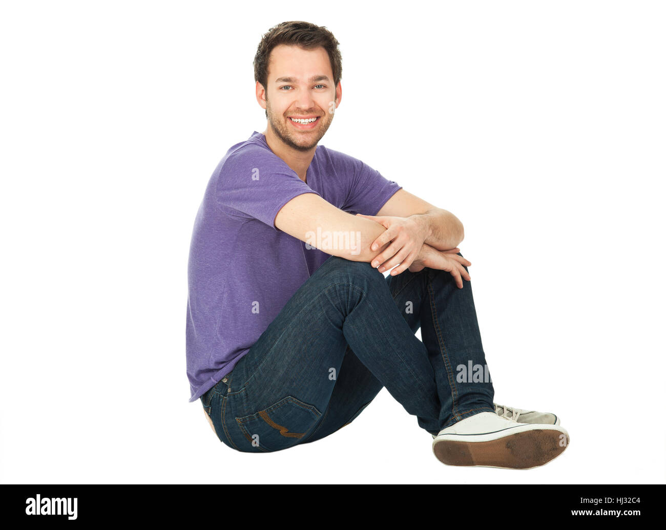 young man sitting Stock Photo - Alamy