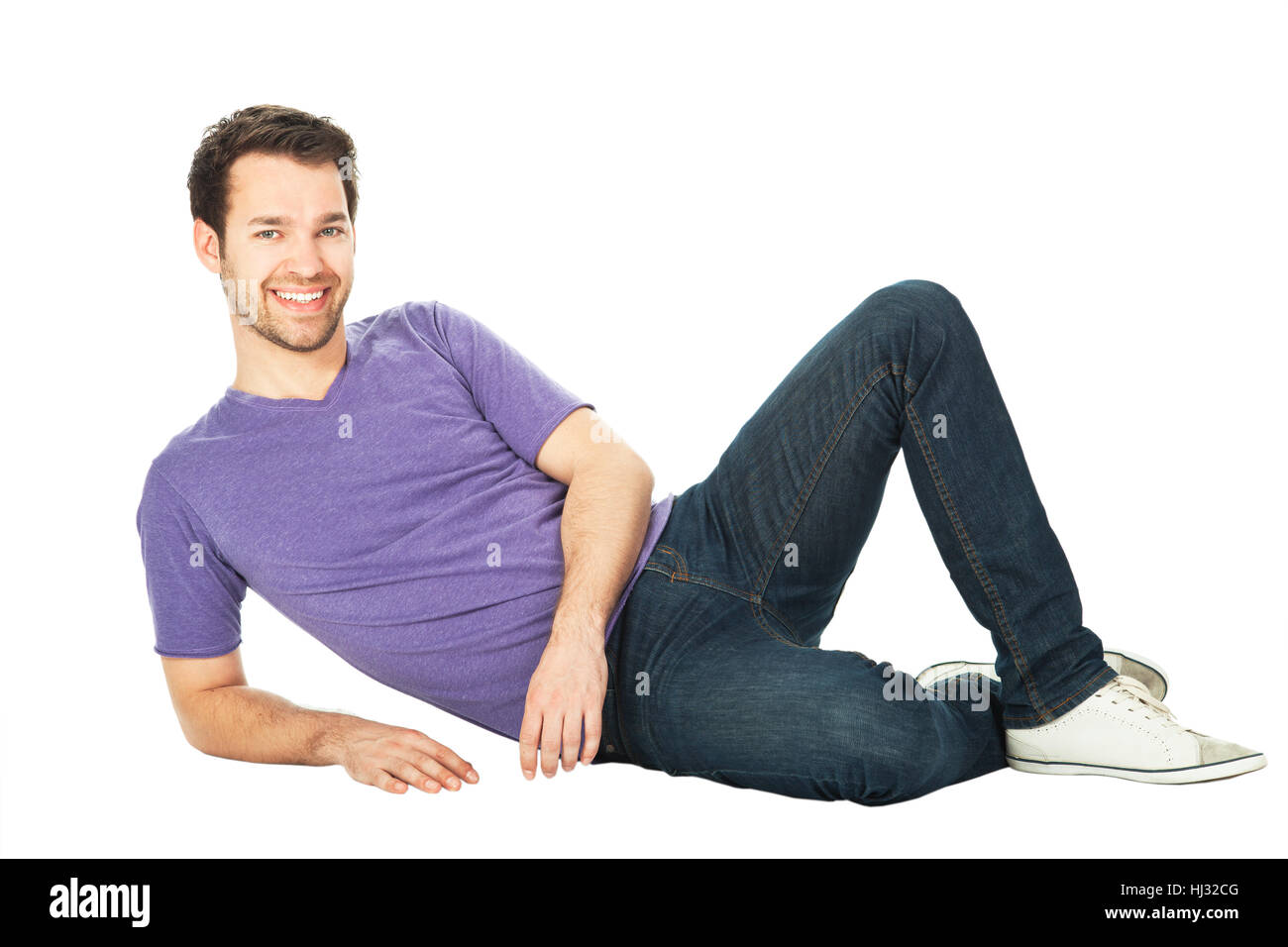 young man sitting Stock Photo - Alamy