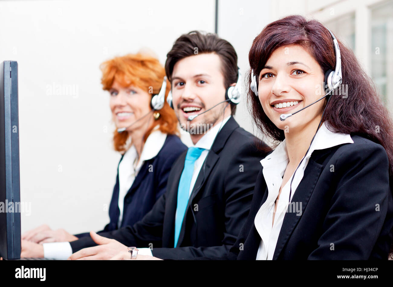 Call center employees talking on hi-res stock photography and images ...