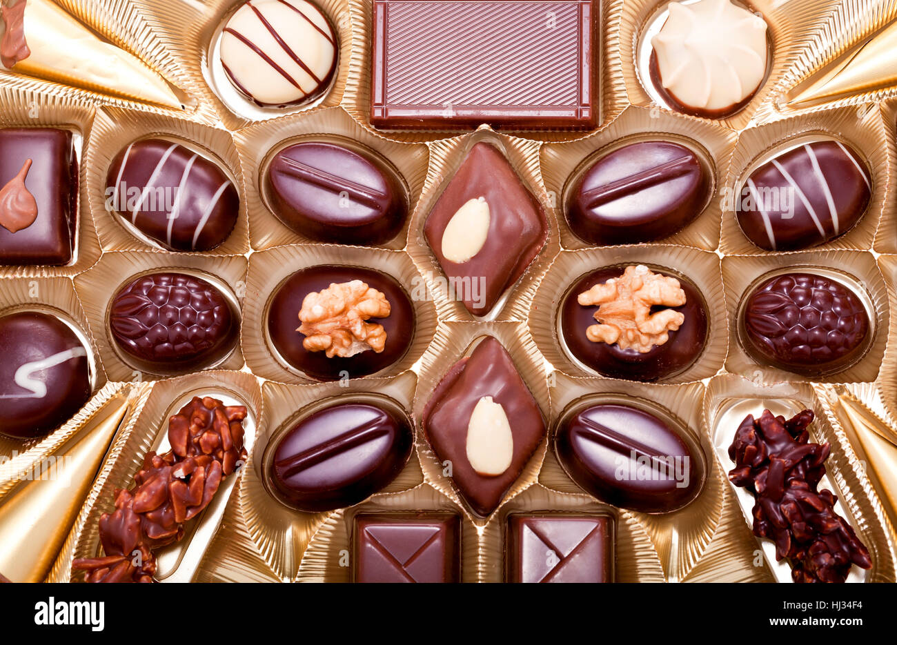 various mixed chocolates made of light and dark chocolate with filling ...