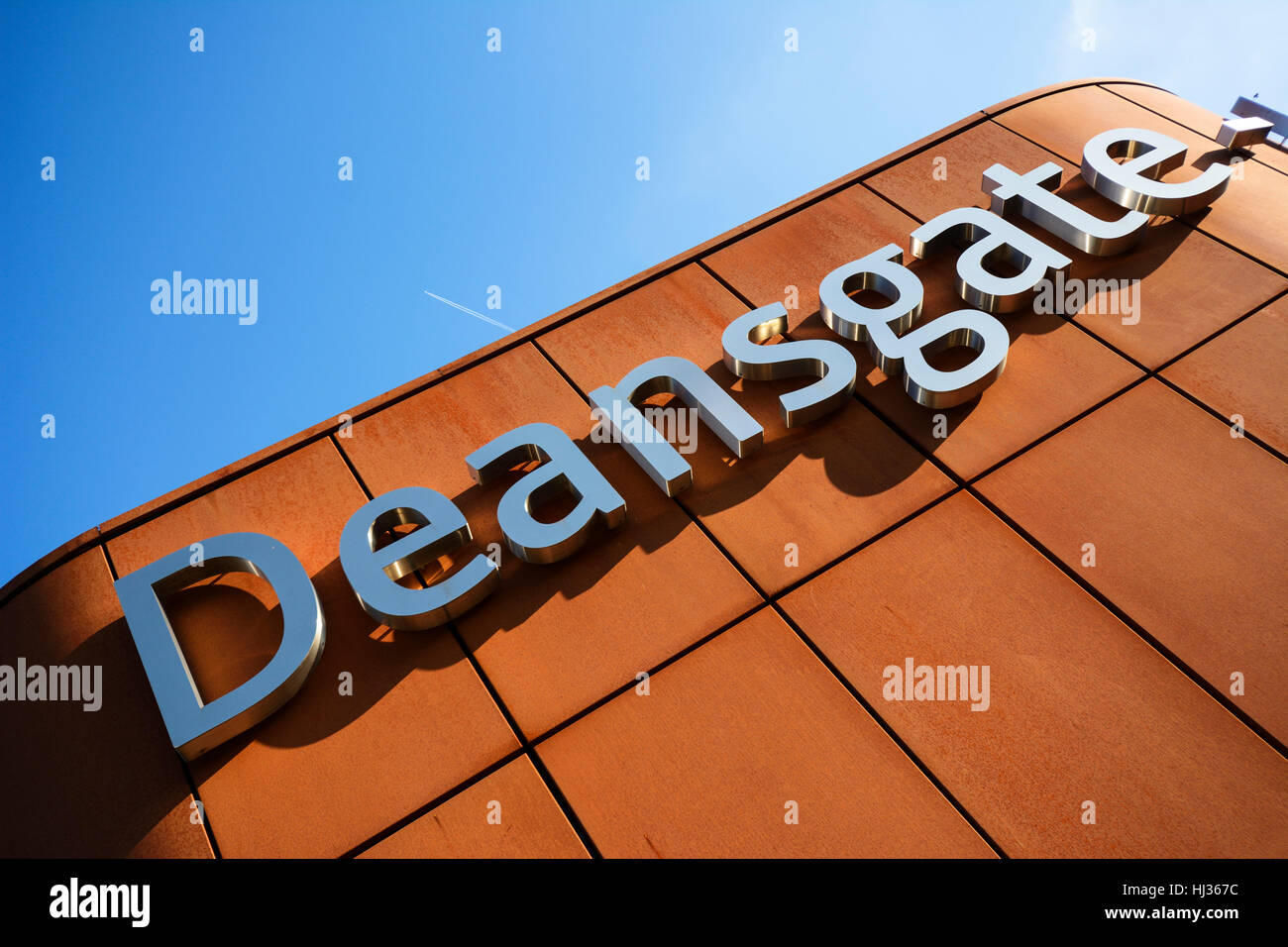 Chrome Deansgate sign on a rusty structure at Deansgate Metrolink tram ...