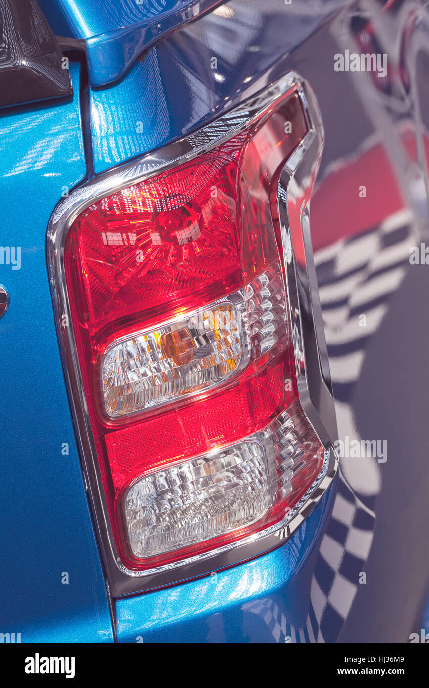 brake lights on a blue car, note shallow depth of field Stock Photo - Alamy