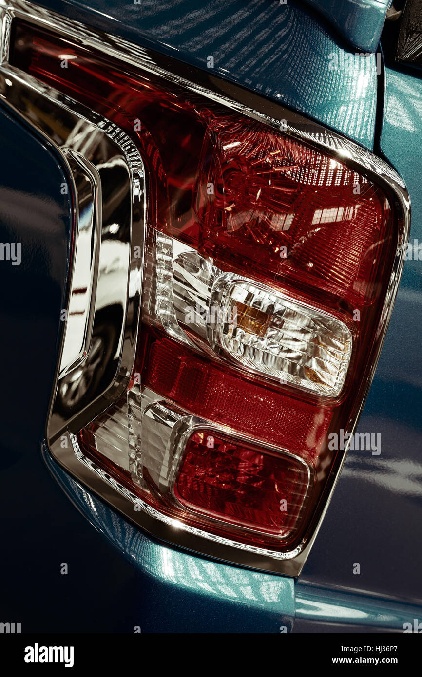 brake lights on a blue car, note shallow depth of field Stock Photo - Alamy