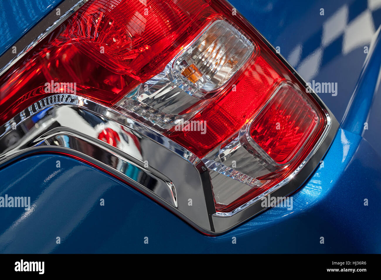 brake lights on a blue car, note shallow depth of field Stock Photo - Alamy