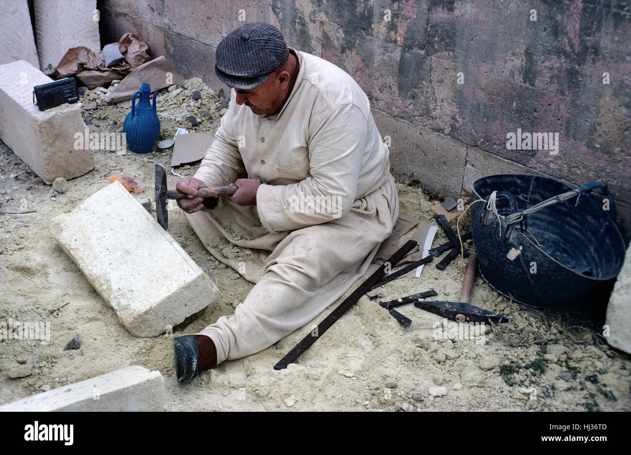 Turkish Stone Mason or Stone Cutter Cutting Stone in Cappadocia Turkey ...