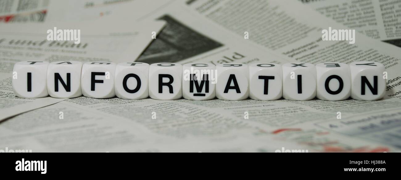 the word information lying on a newspaper background Stock Photo - Alamy
