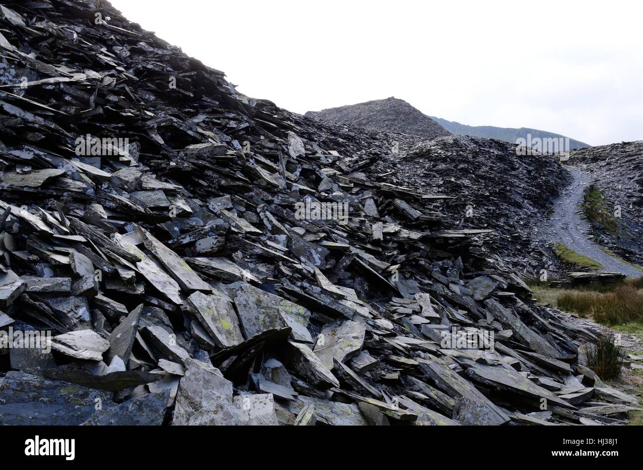 Trail through slate spoil heaps of abandoned Rhosydd slate mines quarry ...
