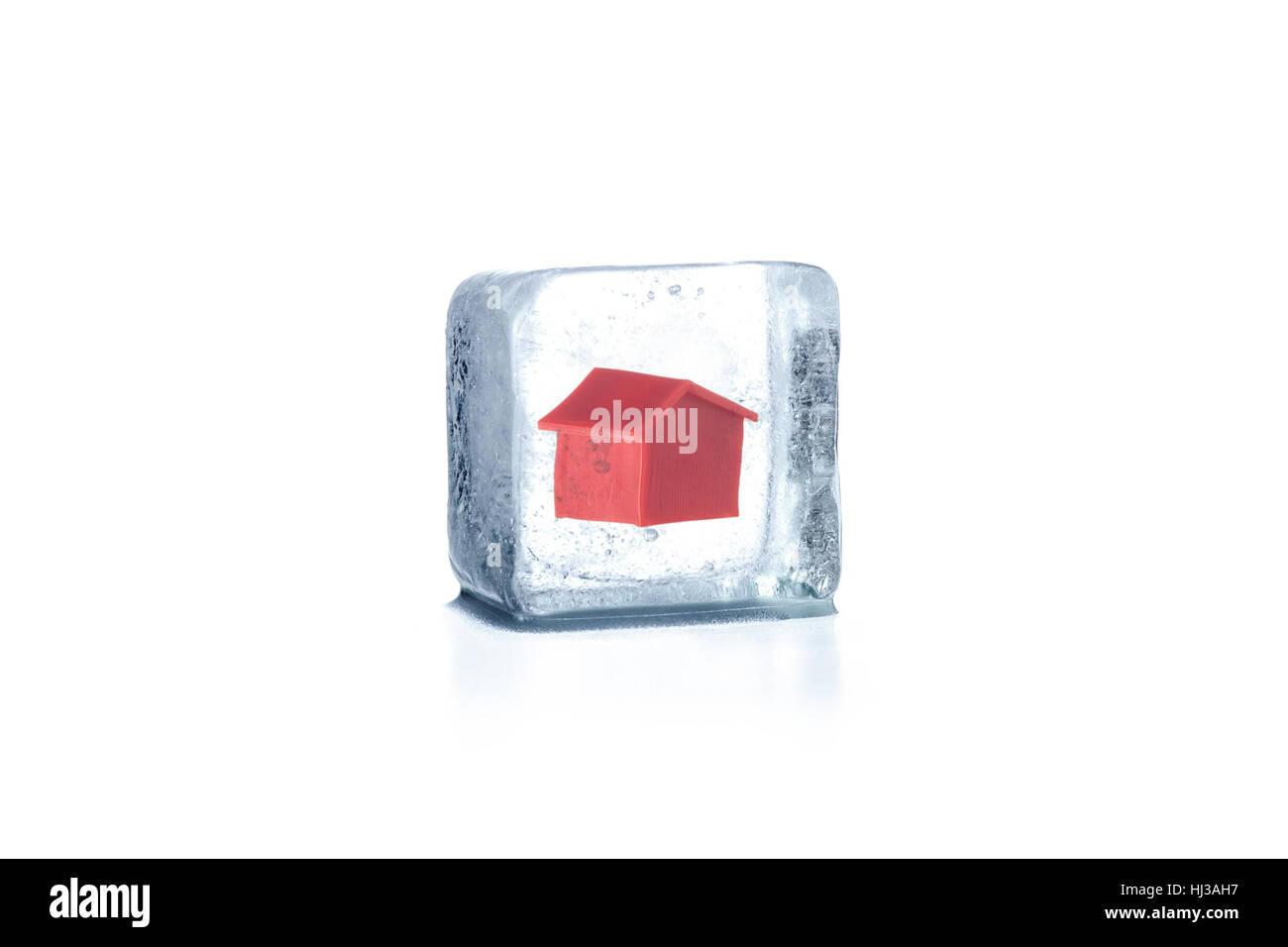 house in ice cube Stock Photo - Alamy