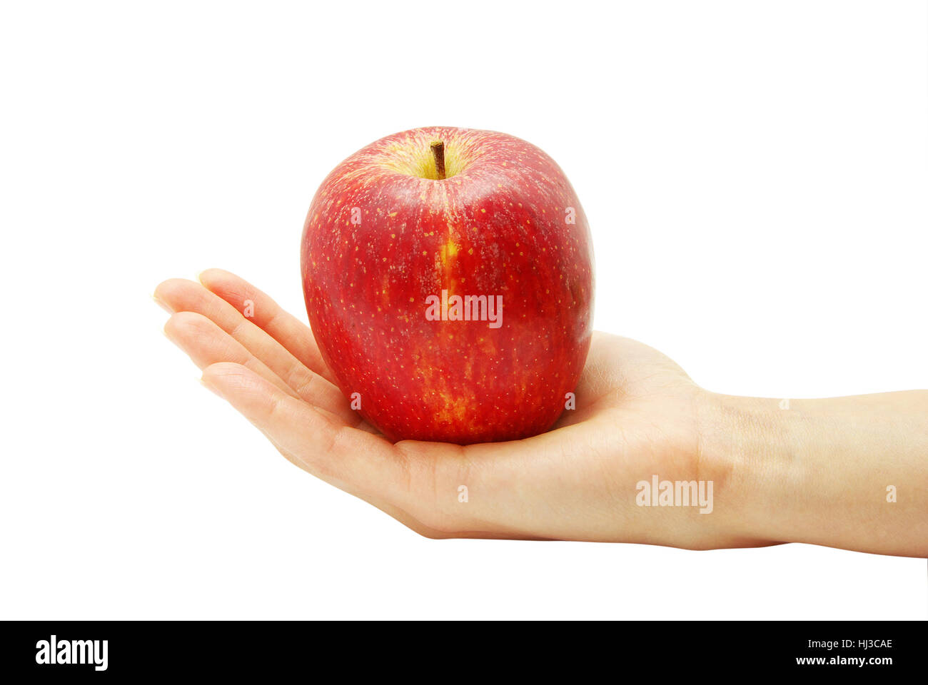 Hand with apple isolated on white background Stock Photo - Alamy