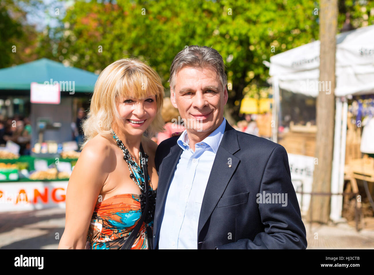 city, town, spring, seniort, walk, go for a walk, couple, pair, age ...