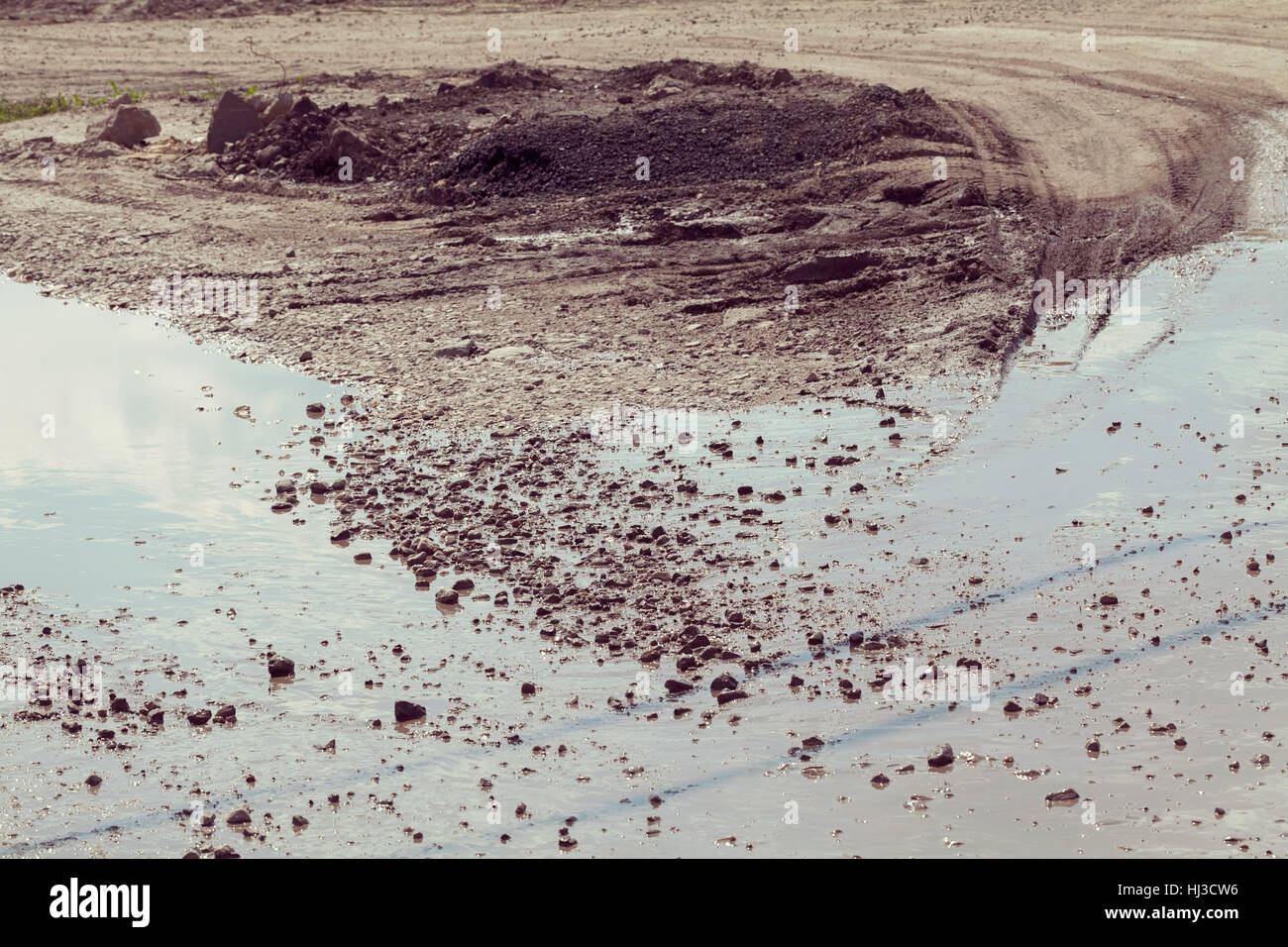 Mud on site after rain, note shallow depth of field Stock Photo - Alamy