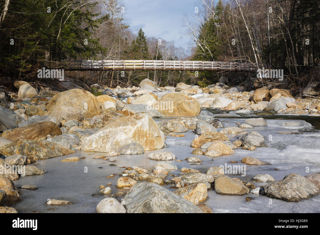 Looking upstream at the foot bridge that crosses the Dry River along ...