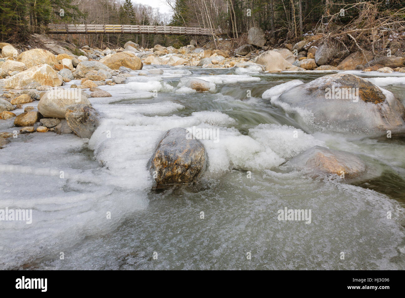 Looking upstream at the foot bridge that crosses the Dry River along ...