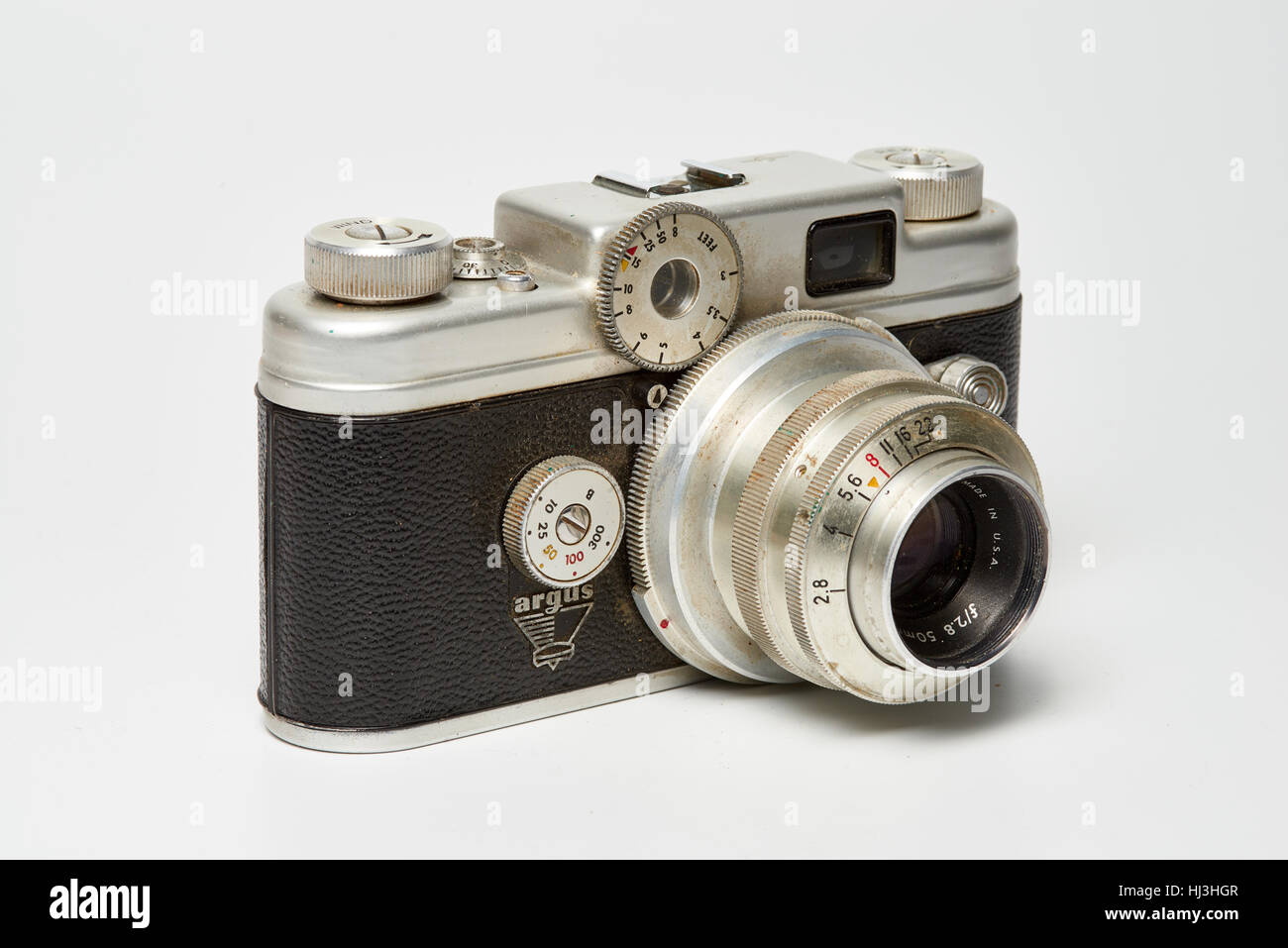 Argus C-Four 35 mm film over black, isolated. Analogic film camera ...