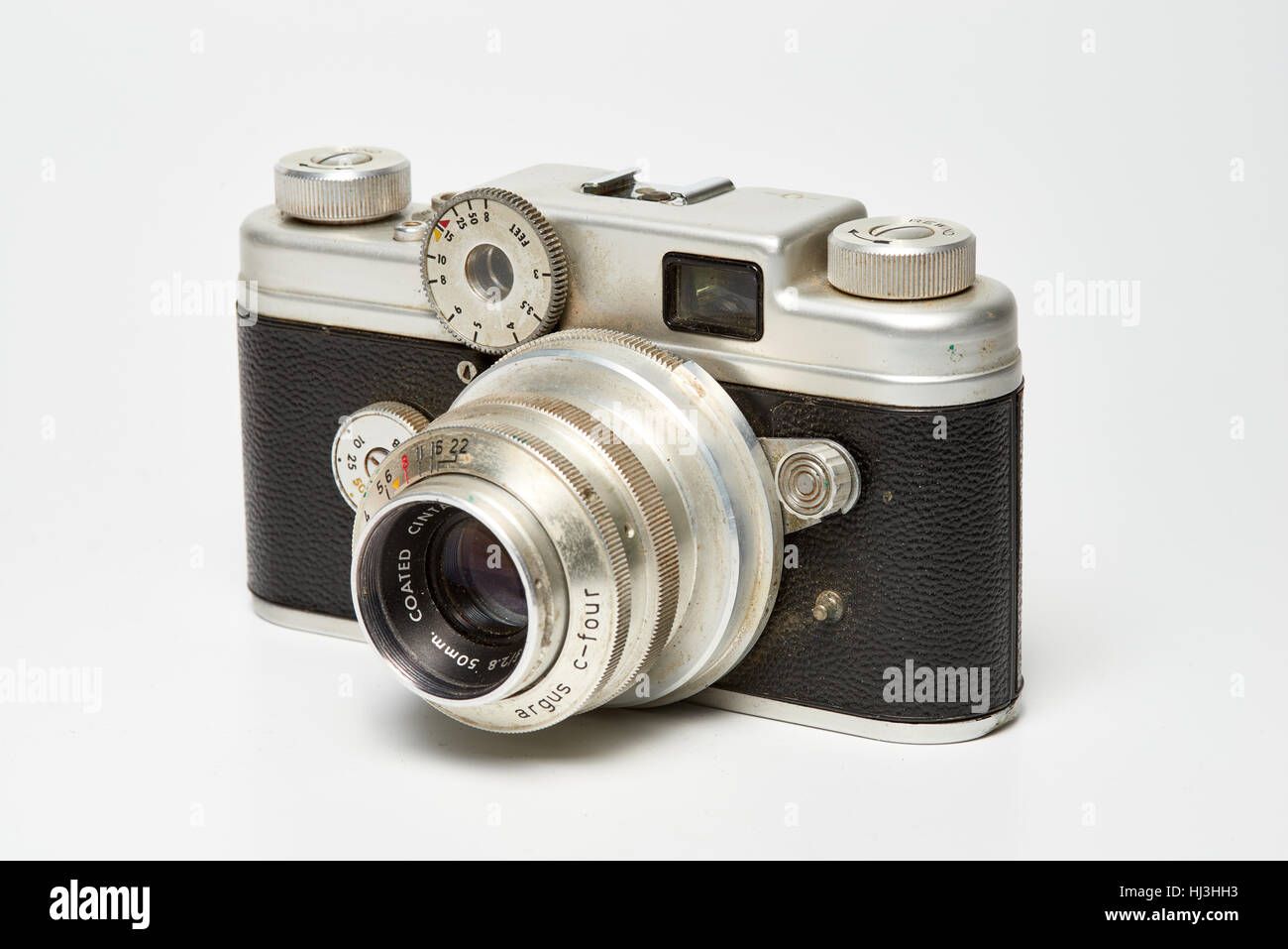 Argus C-Four 35 mm film over black, isolated. Analogic film camera ...