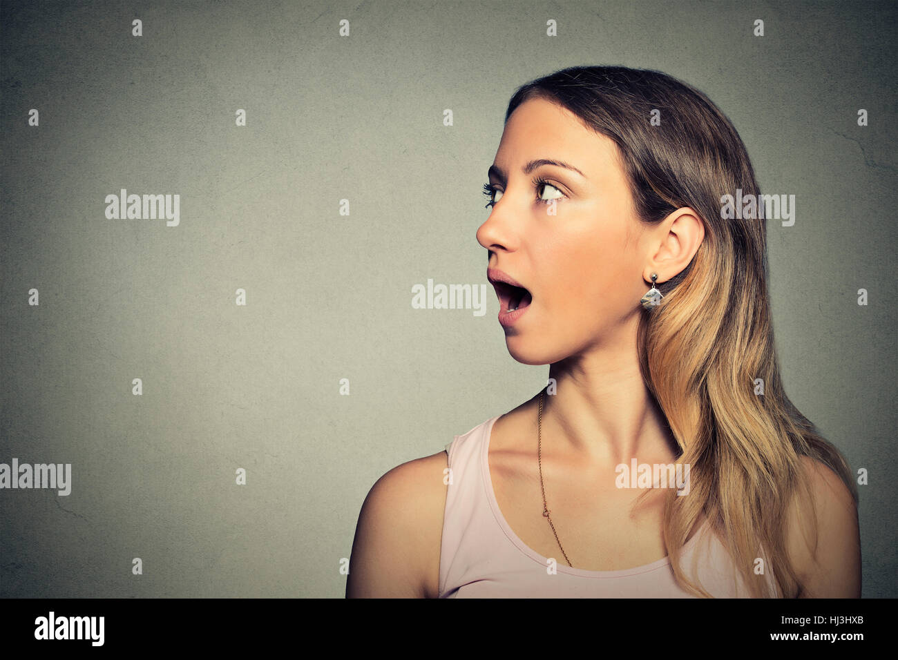 Closeup side view profile portrait woman talking with sound coming out ...