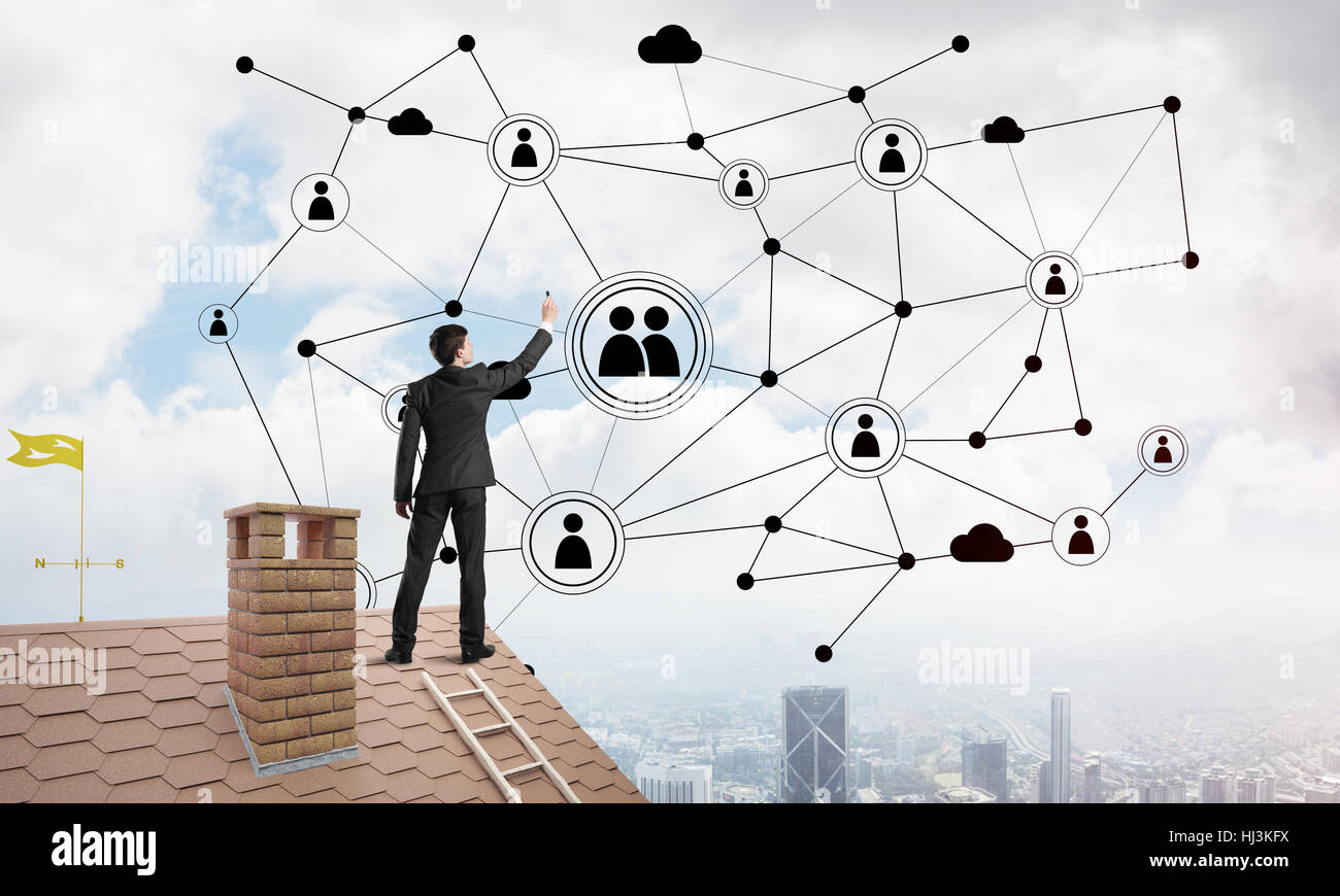 Businessman on house roof presenting networking and connection concept ...
