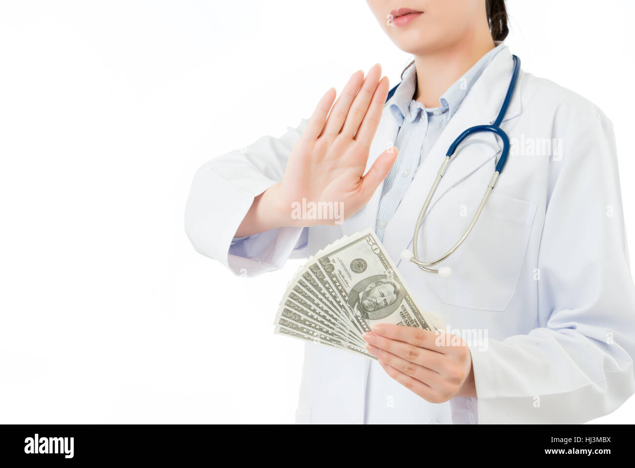 asian woman doctor refuse money bribery with no gesture. isolated on ...