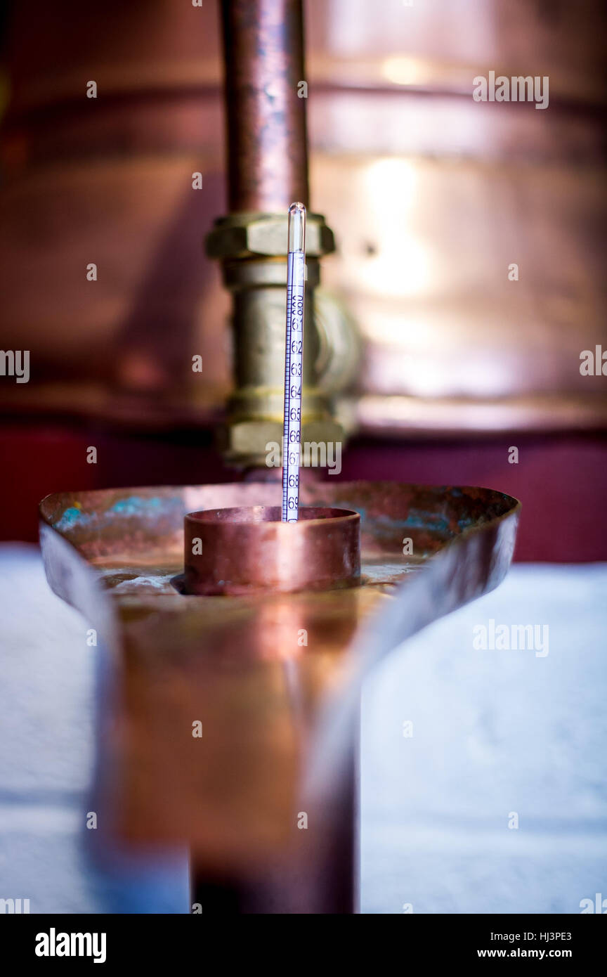 Various stages of gin distillation in Scotland Stock Photo - Alamy